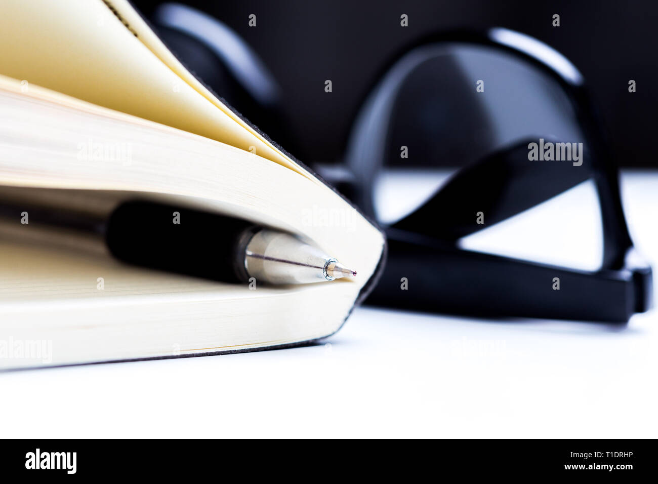 Pen and notebook close up Stock Photo - Alamy