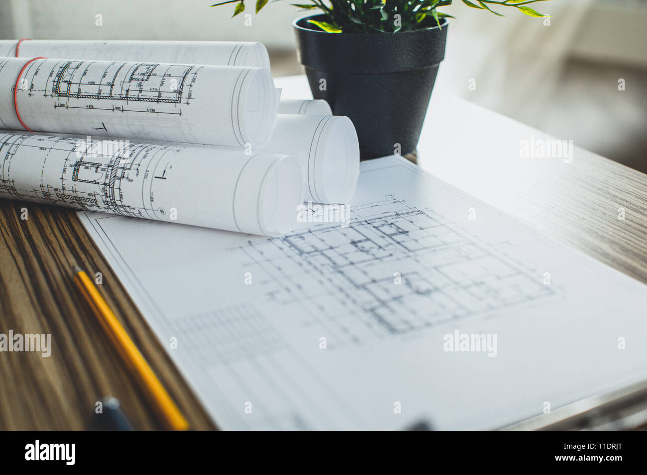Project drawings and tools, close up Stock Photo - Alamy