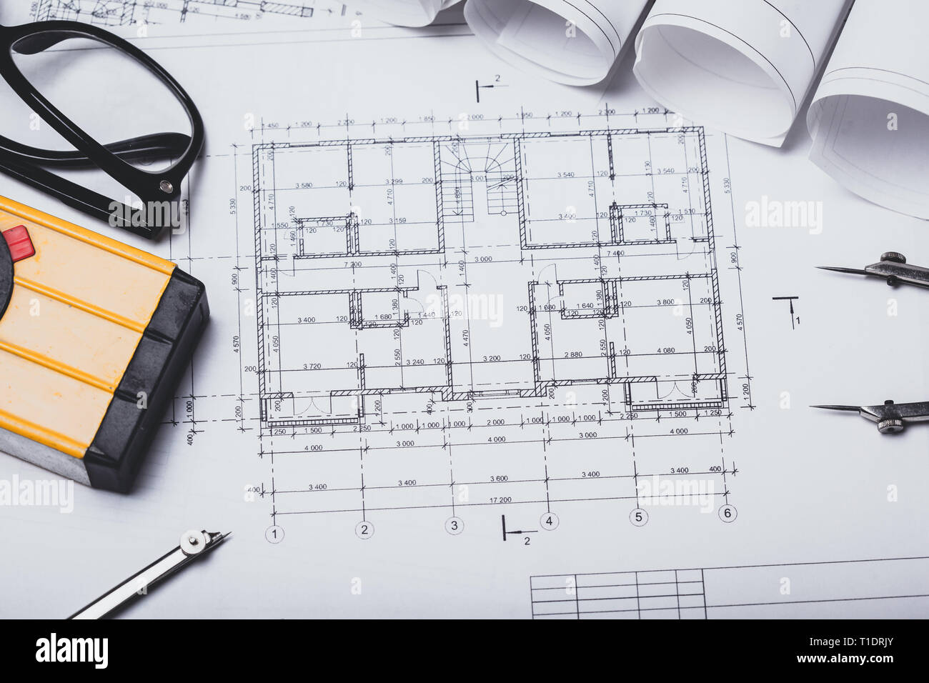 Project drawings and tools, close up Stock Photo - Alamy