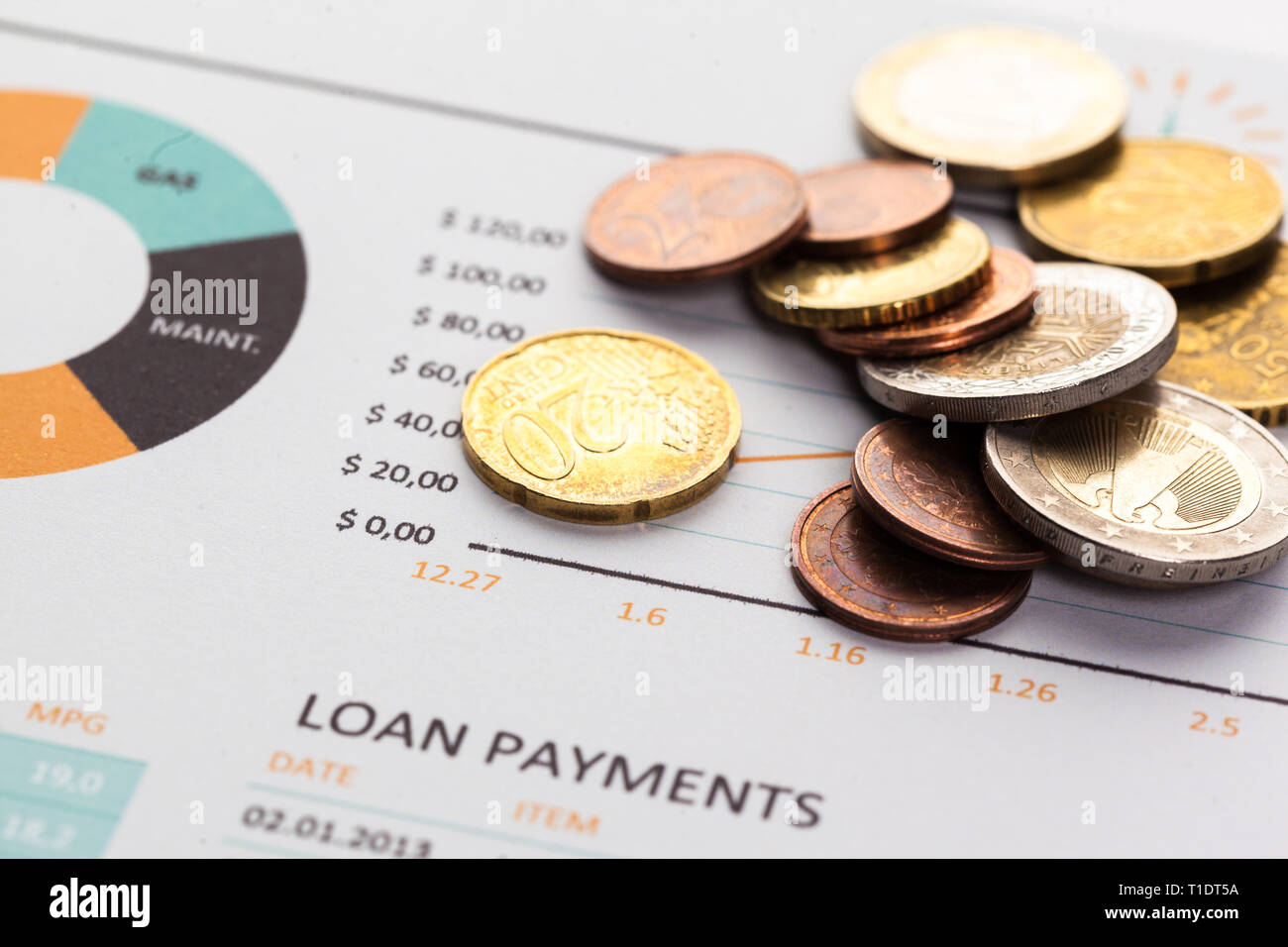 Graph Of Stock Market With Stacks Of Coins Stock Photo - Alamy