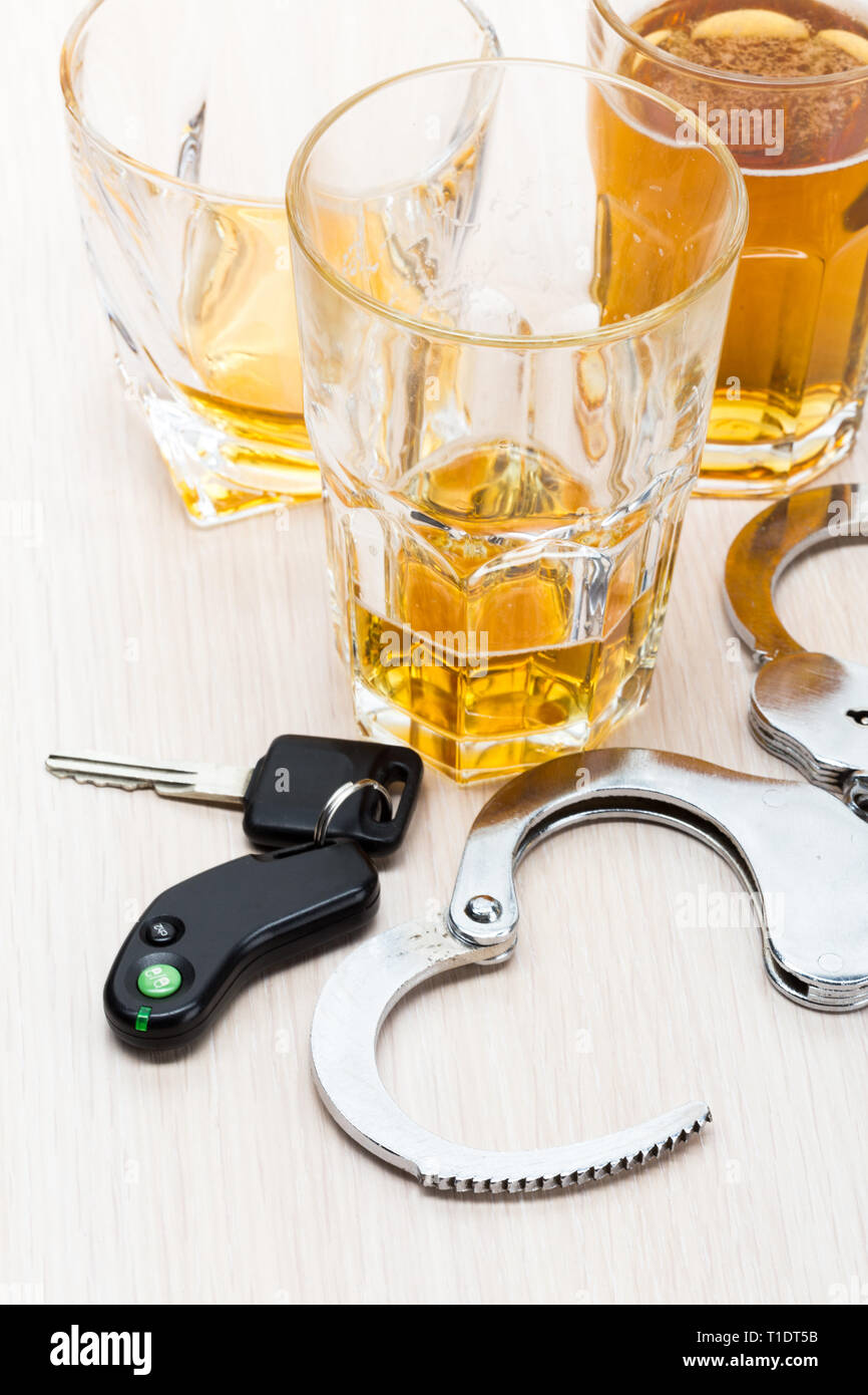 Car key on the bar with spilled alcohol Stock Photo - Alamy