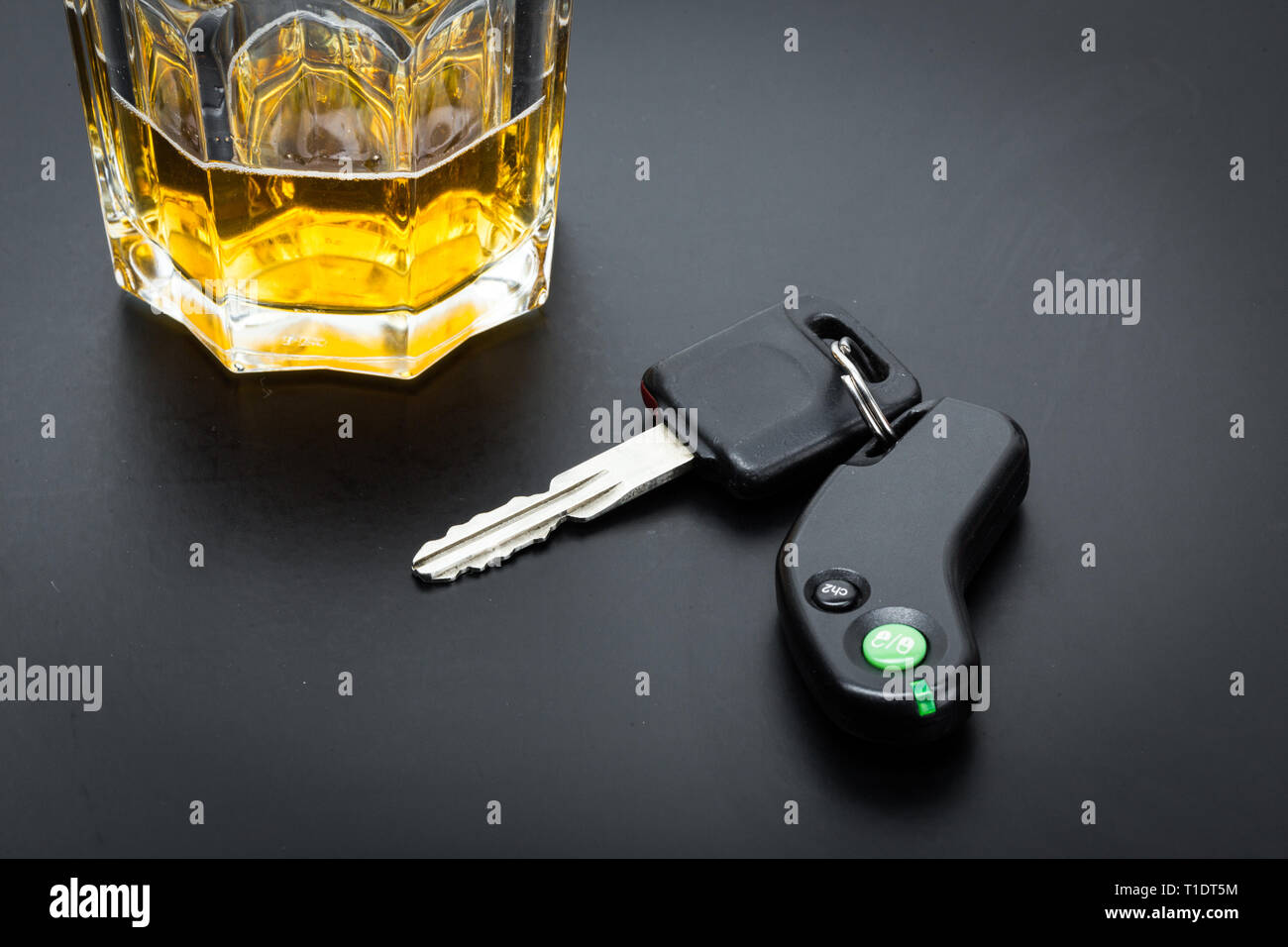 Car key on the bar with spilled alcohol Stock Photo - Alamy