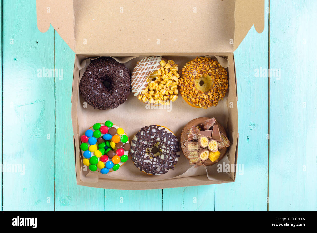 Colorful donuts in box Stock Photo - Alamy