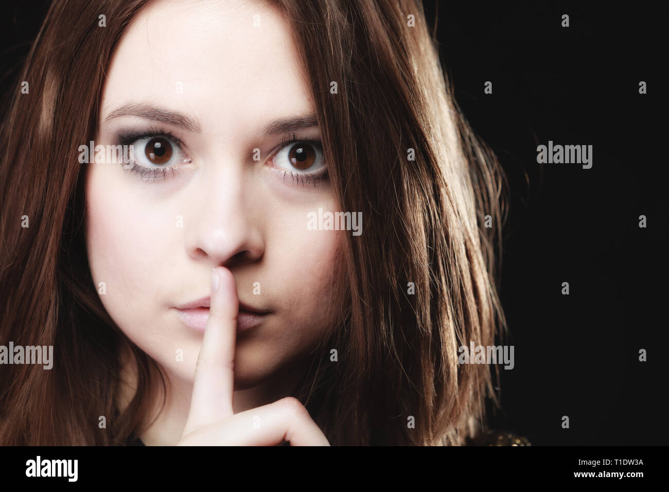 Secret woman finger on lips. Teen girl showing hand silence sign ...