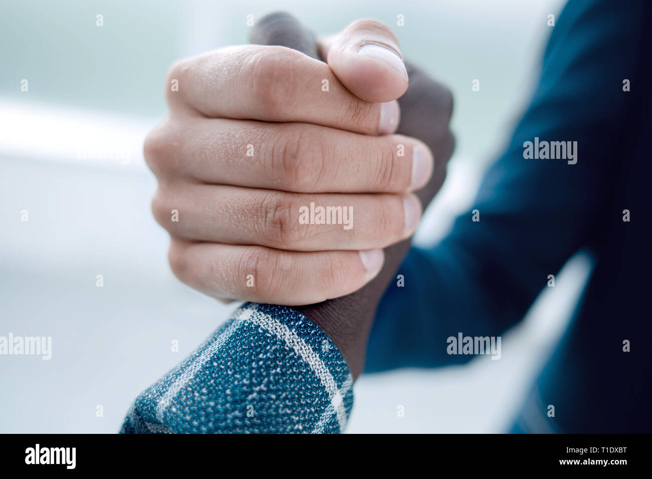close up.strong handshake of business partners Stock Photo - Alamy