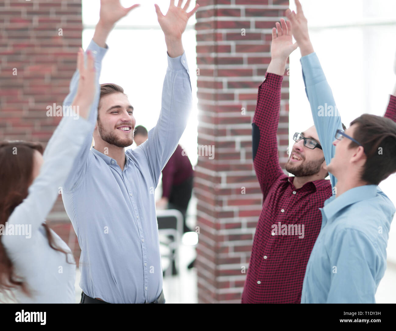 Business people giving five after hi-res stock photography and images ...