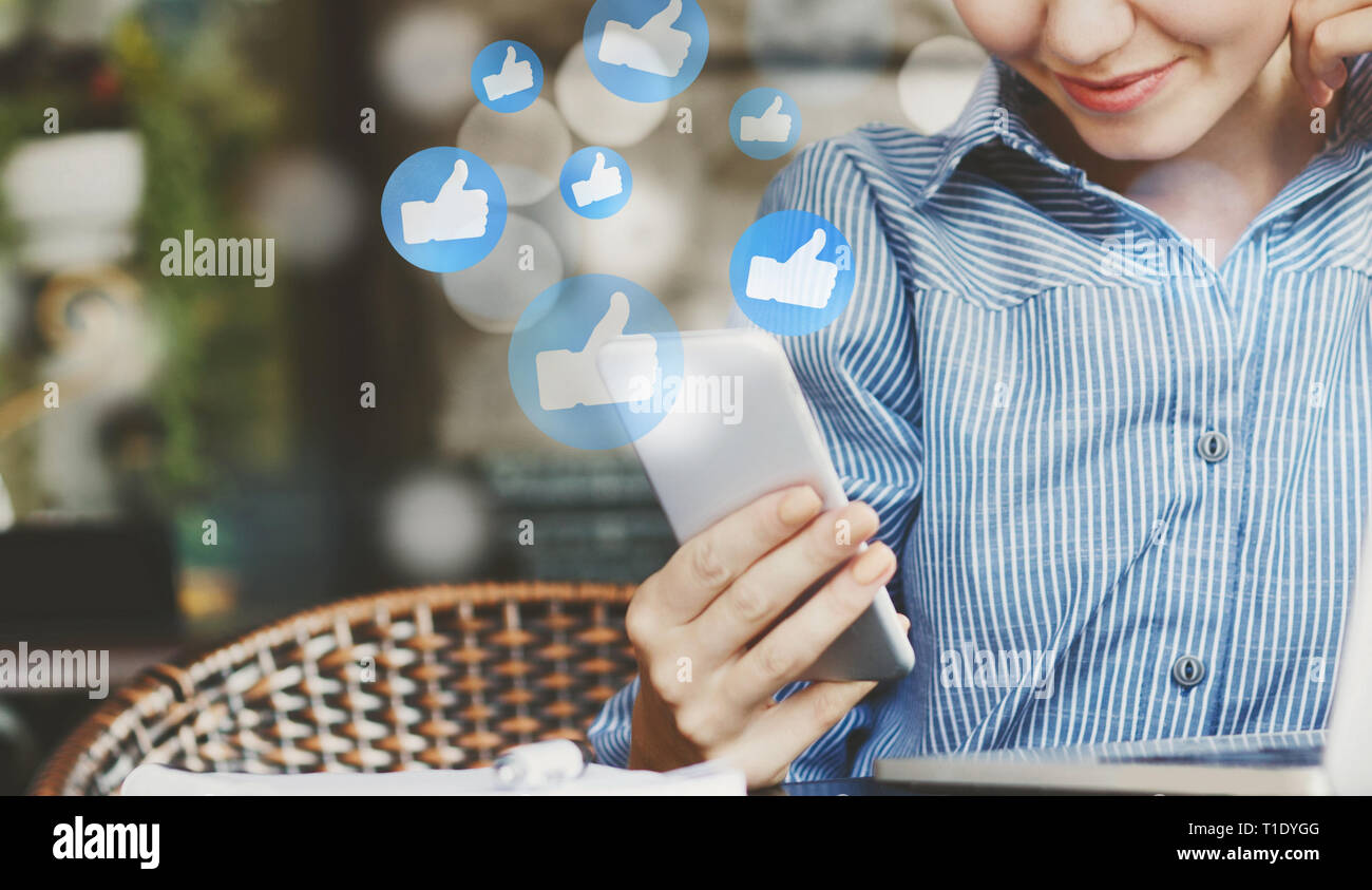 Girl using social media app on mobile phone Stock Photo - Alamy