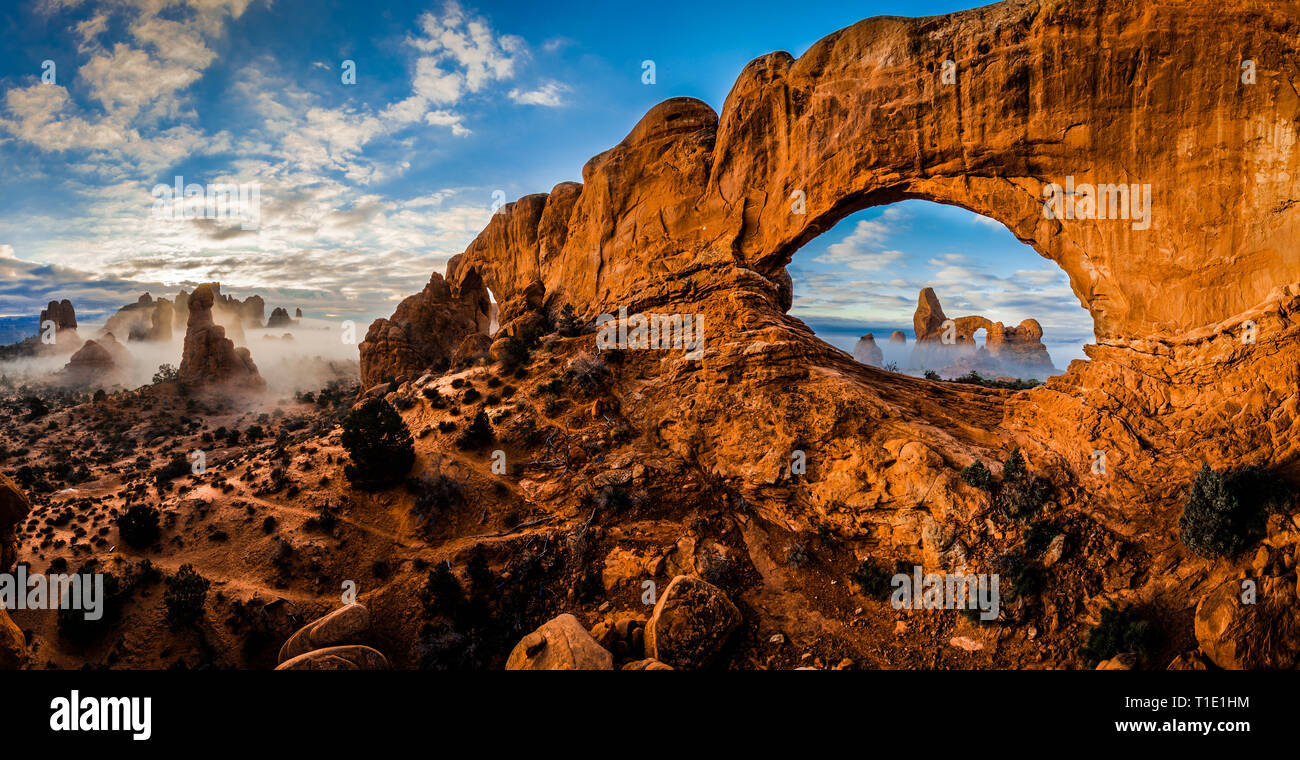 Sunrise panorama at north window as fog flows across the desert floor ...