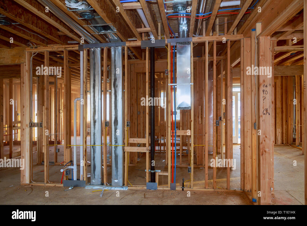 Home Framing unfinished wood building or a house under construction ...
