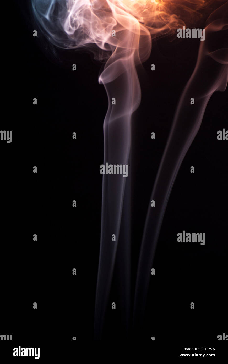 Beautiful smoke on the black background - macro photo Stock Photo - Alamy