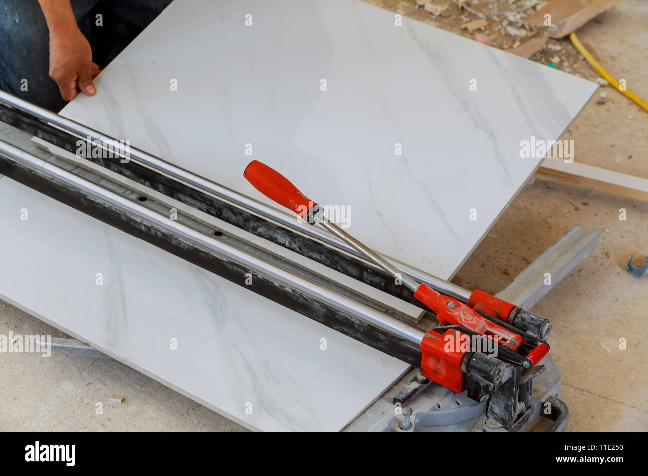 working with floor tile cutting equipment repair industrial tiler ...