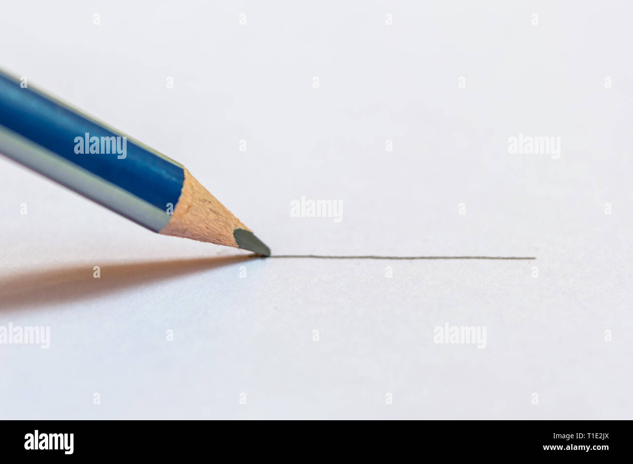 A line drawn with a pencil on a white background Stock Photo - Alamy