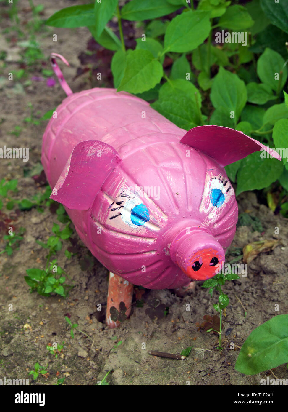 Pink pig made from old plastic bottle Stock Photo - Alamy