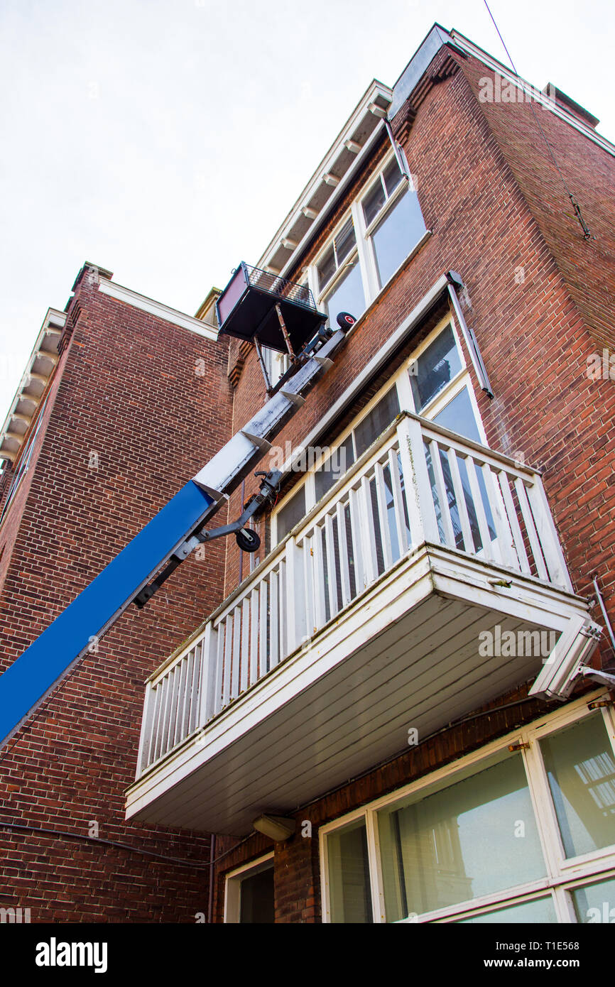The Used blue Boom Lifts for repair and washing windows. Lift on the ...