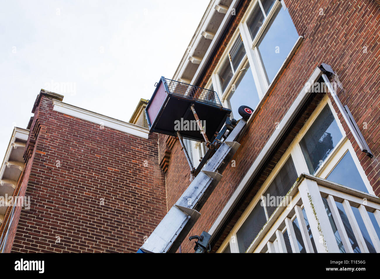 The Used blue Boom Lifts for repair and washing windows. Lift on the ...