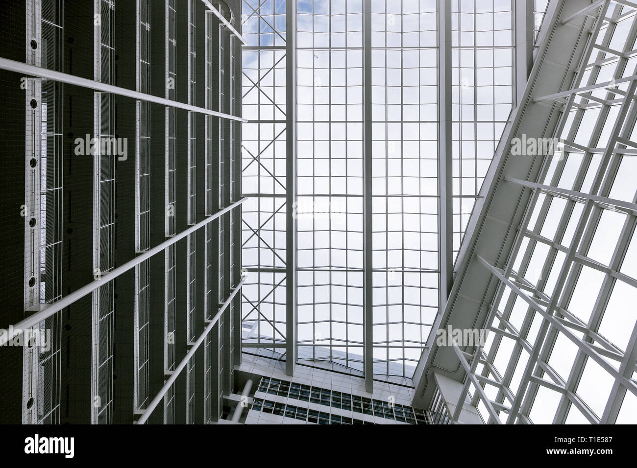 Modern high-tech design of white office building over blue sky. New ...