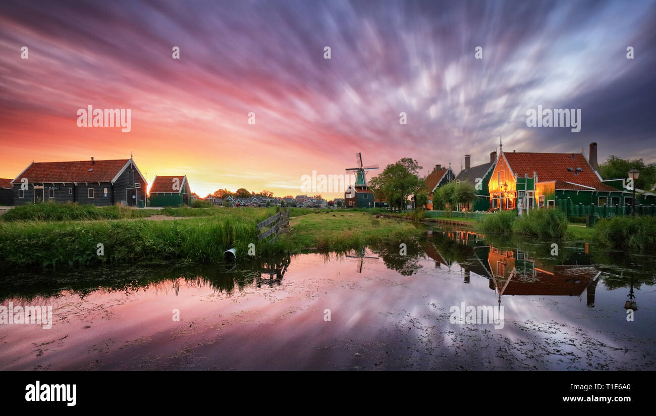 Dutch landscape with windmill at dramatic sunset, Zaandam, Amsterdam ...