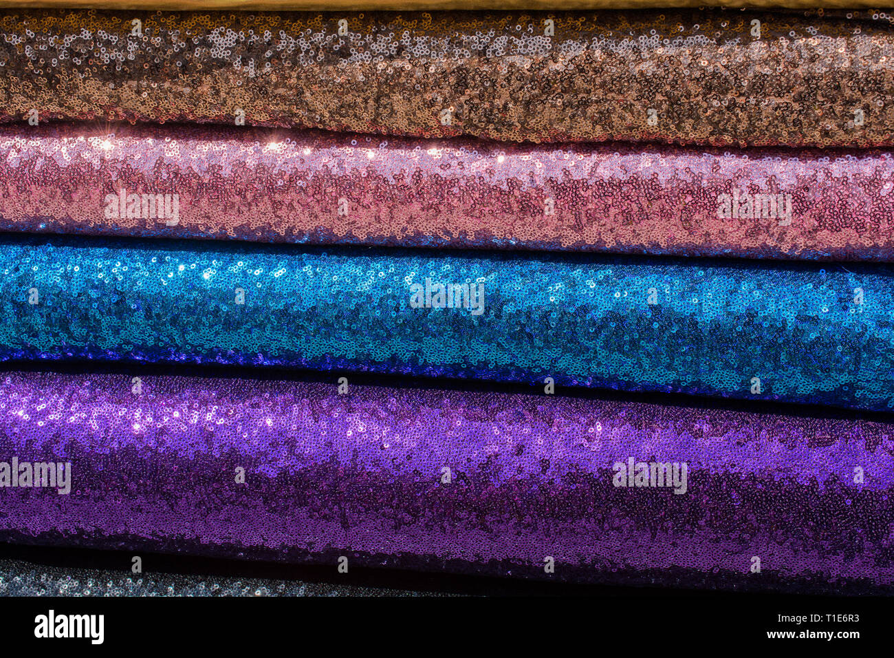 Examples of bright fabric of various color in view Stock Photo - Alamy