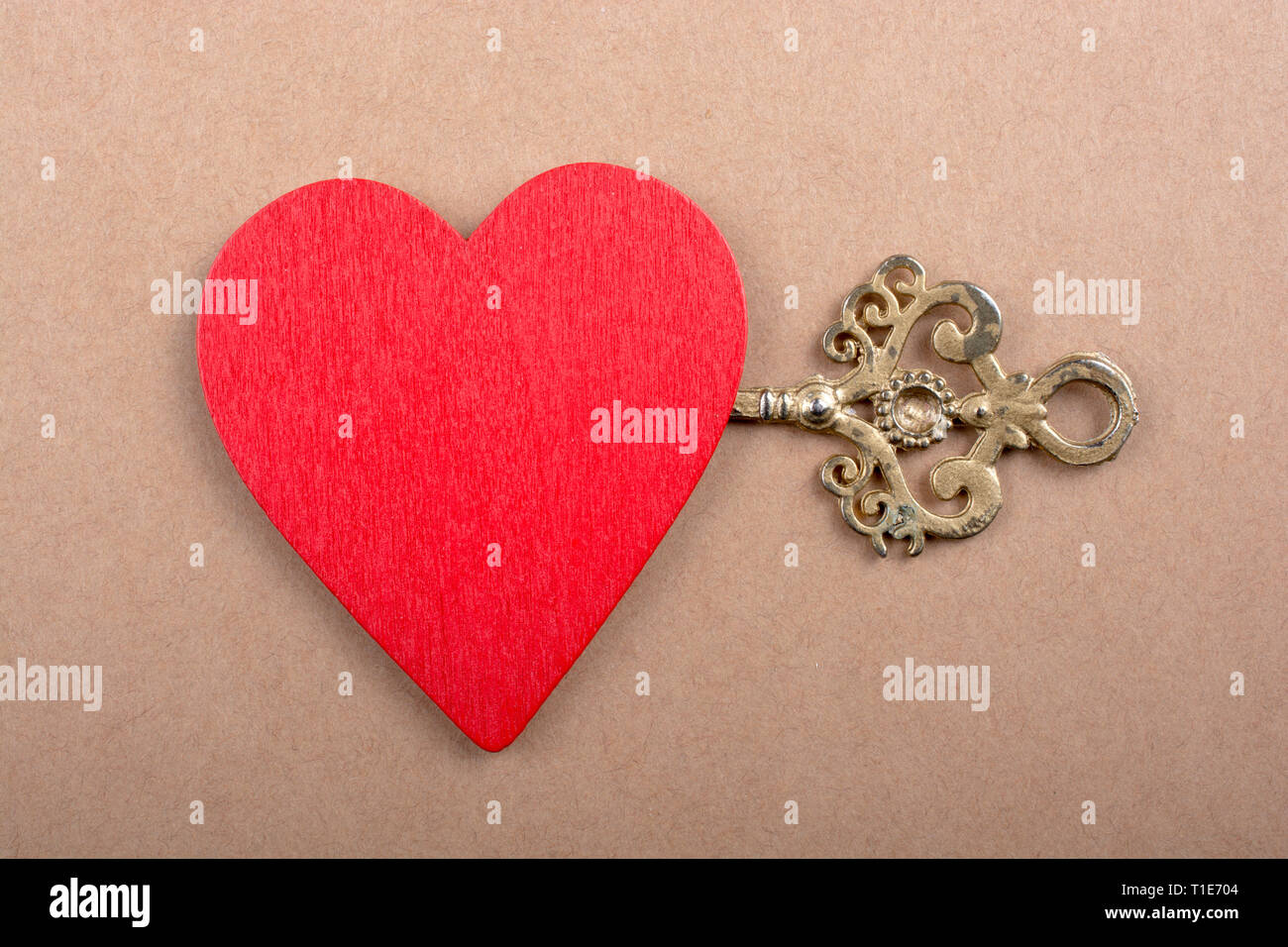 Retro styled decorative key and paper heart shape Stock Photo - Alamy