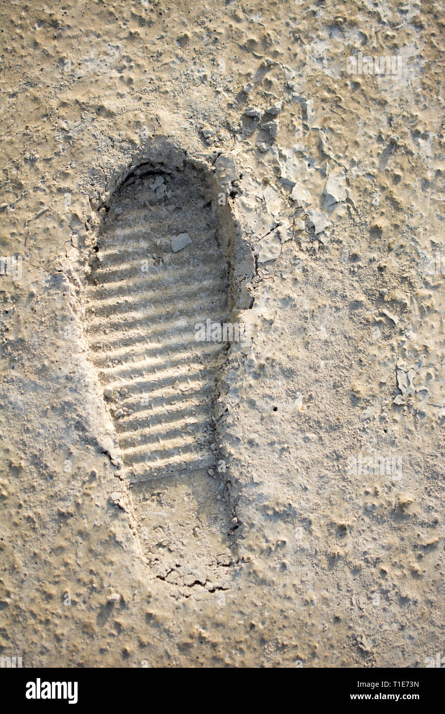 Footstep pattern seen on a concrete background Stock Photo - Alamy