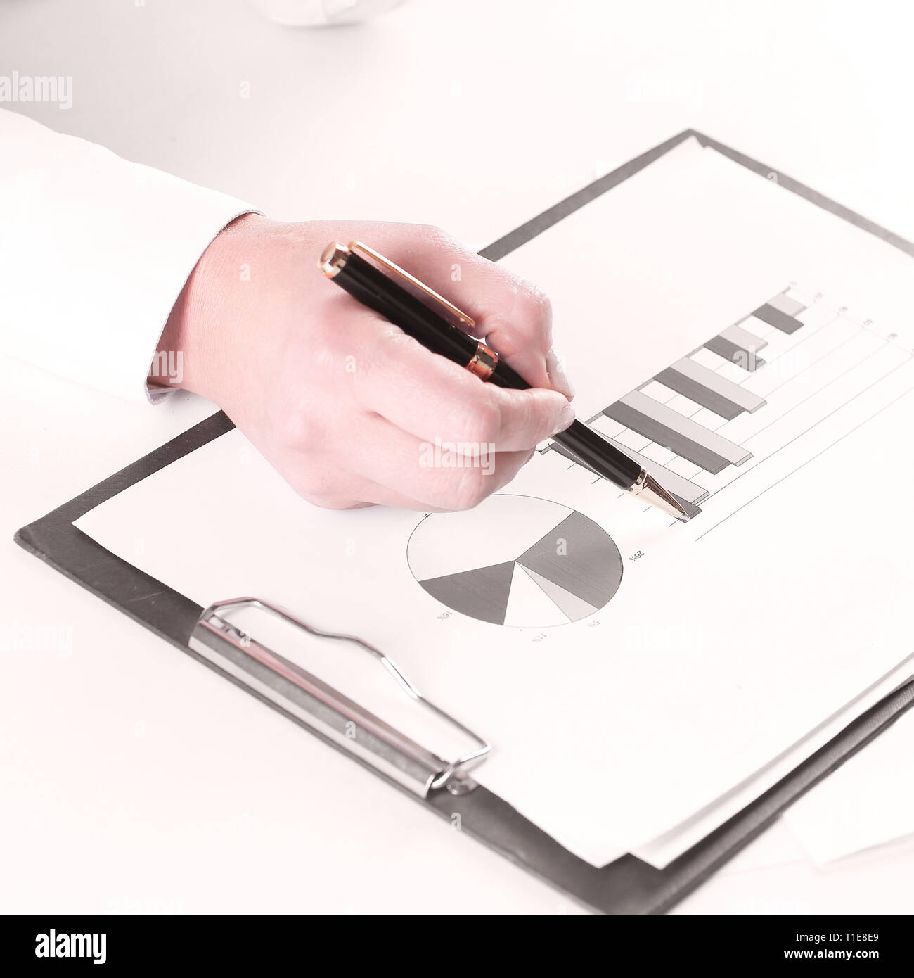 closeup. business woman checking marketing graphics. sales Manager ...