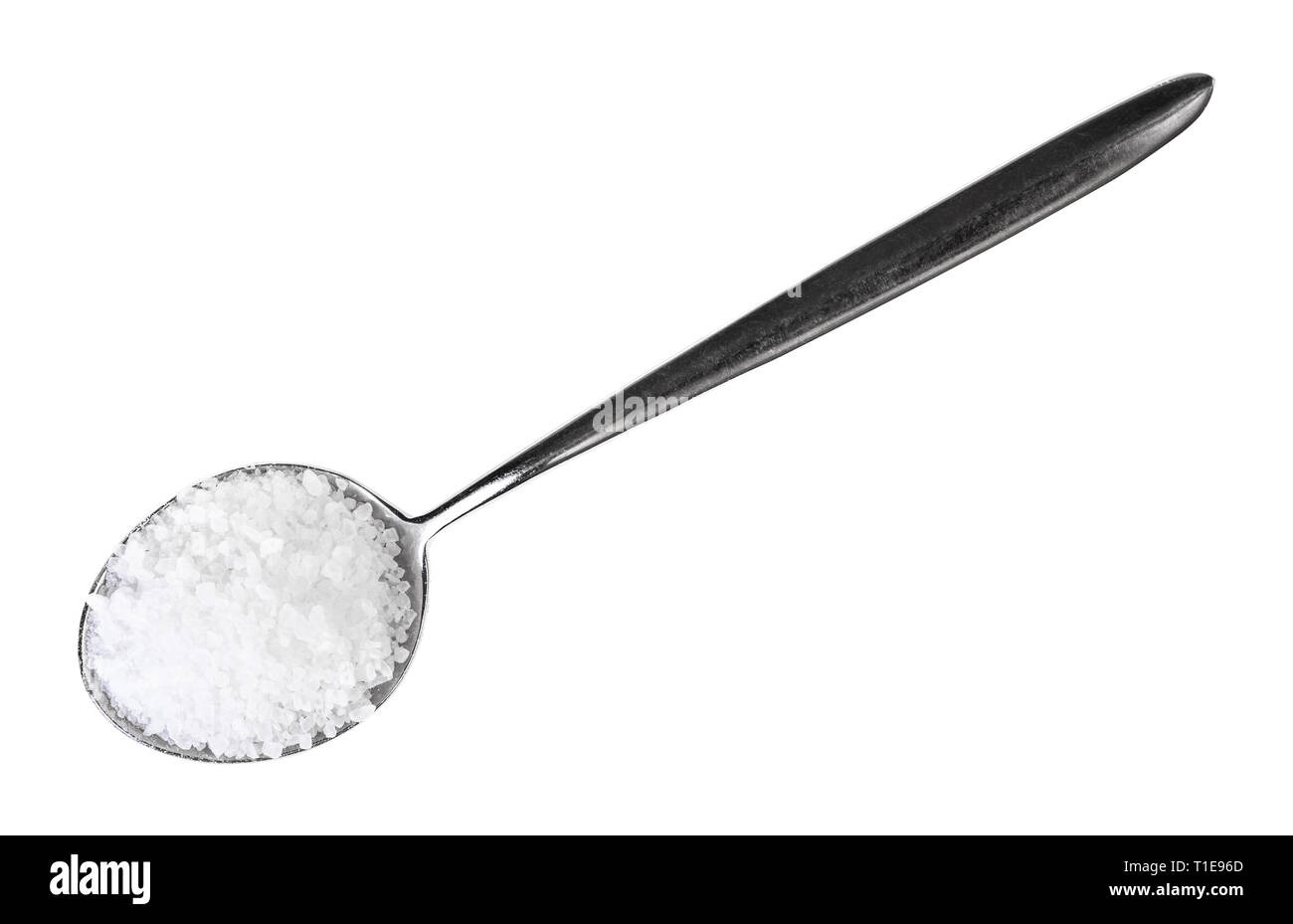 top view of tablespoon with coarse grained Sea Salt isolated on white ...