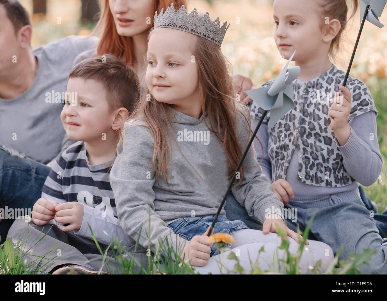 parents and their young children spend the weekend together Stock Photo ...