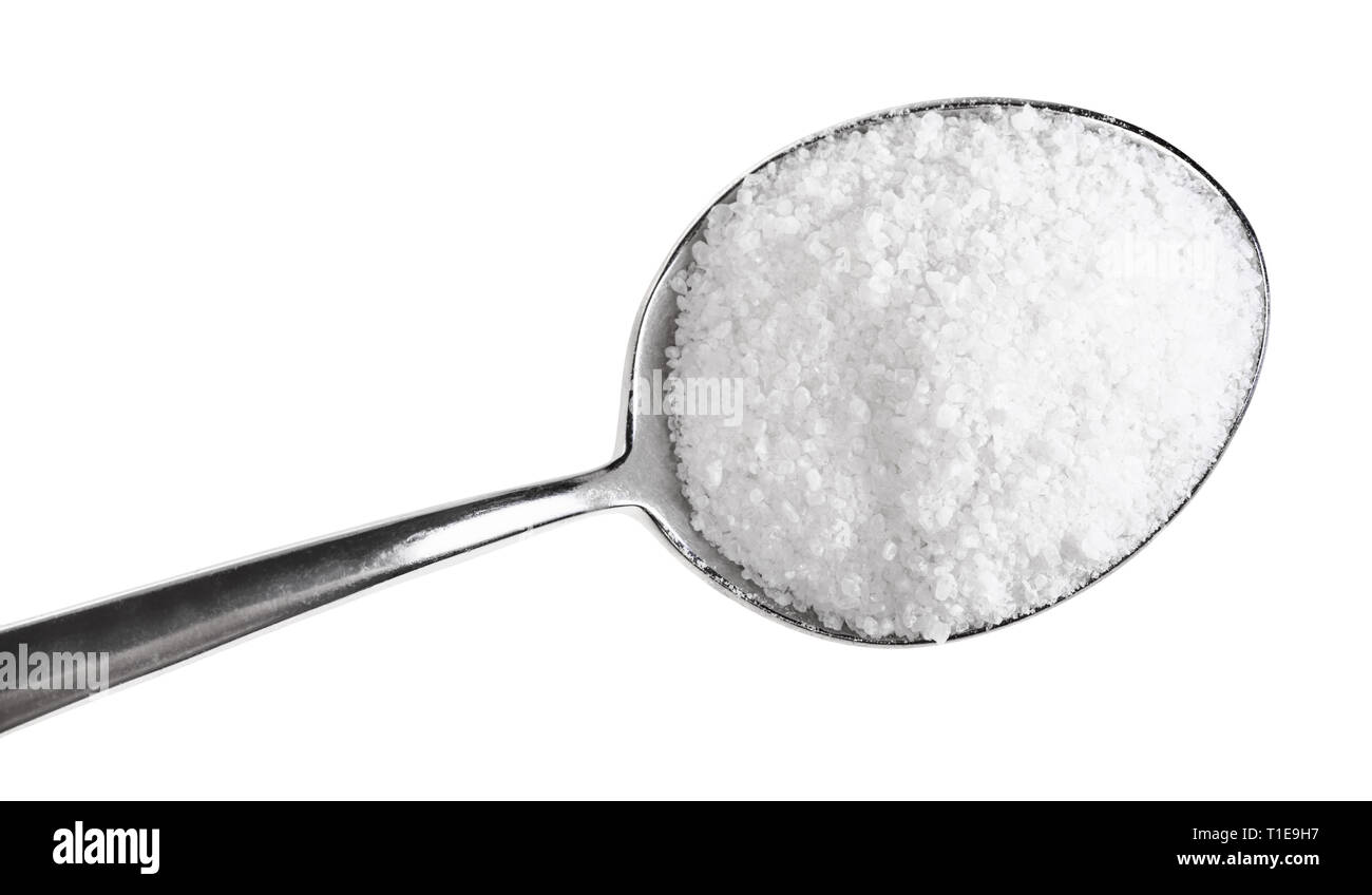 top view of tablespoon with grained Rock Salt close up isolated on ...