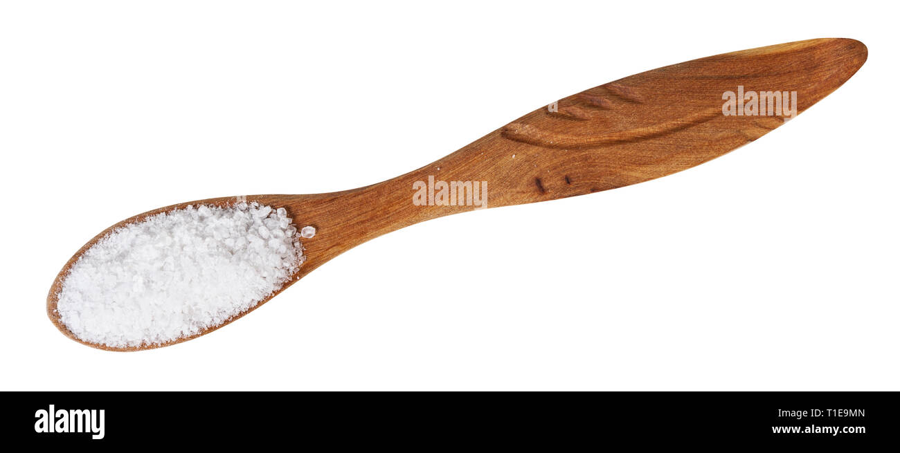 top view of wooden salt spoon with grained Rock Salt isolated on white ...