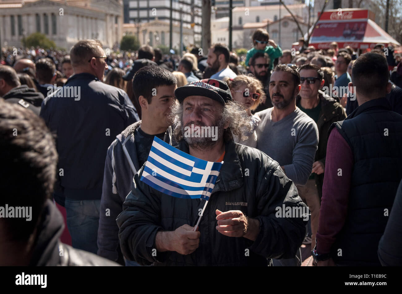 Athens, Greece. 1st Jan, 2006. A man seen holding a Greek flag during ...