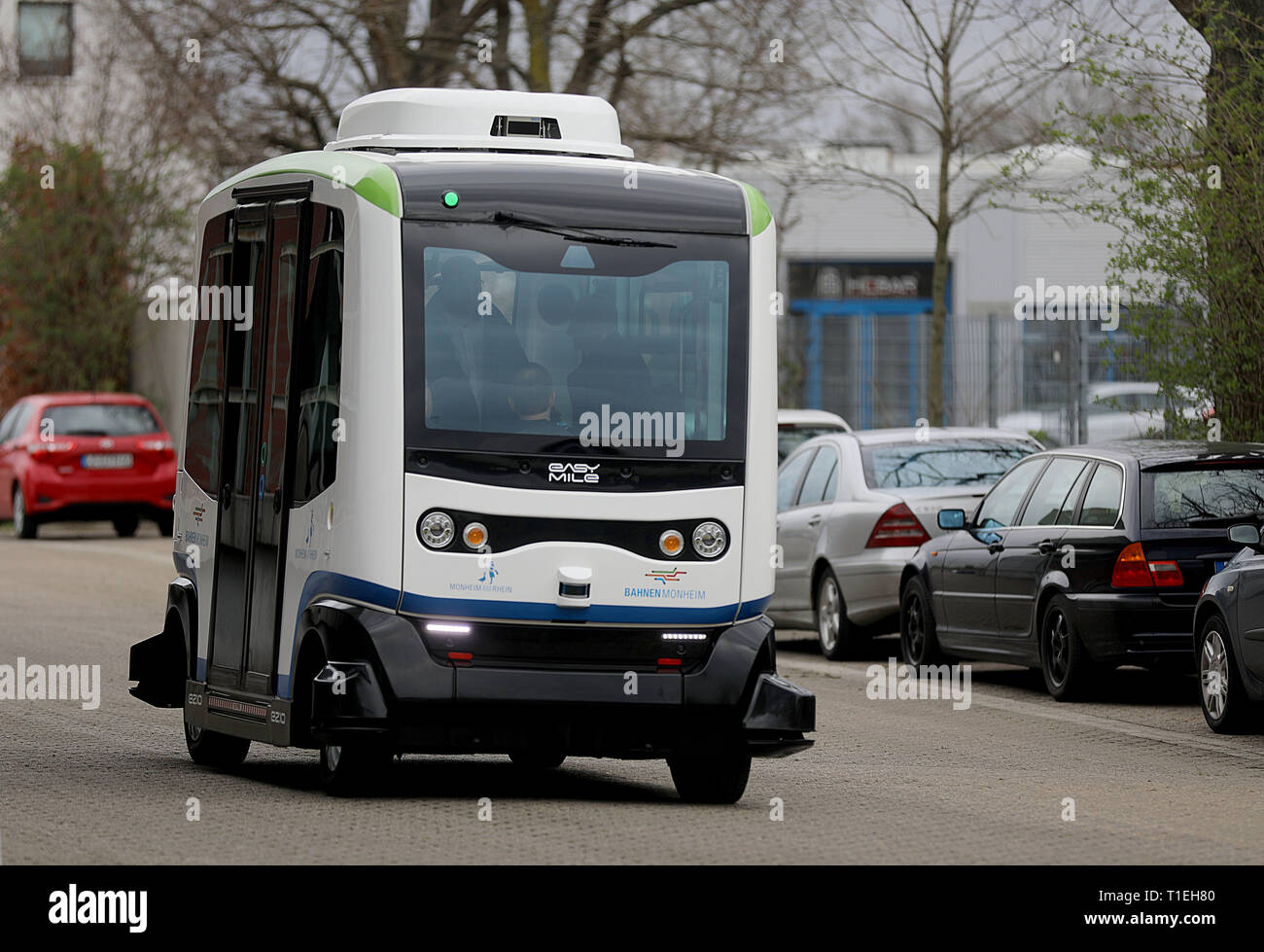 Monheim, Germany. 26th Mar, 2019. An autonomous "easy mile" bus travels ...