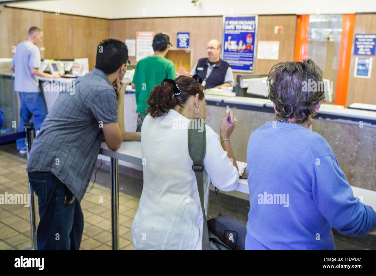Postal service counter hi-res stock photography and images - Alamy