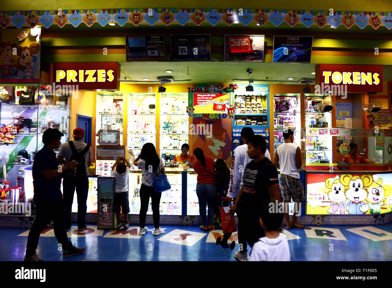 QUEZON CITY, PHILIPPINES - MARCH 24, 2019: Customers try different ...