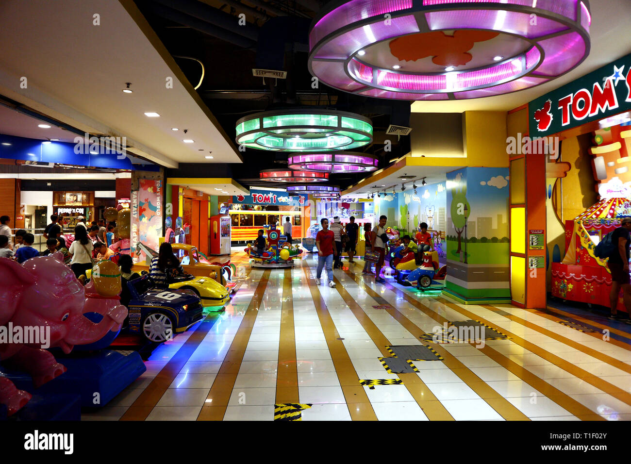 QUEZON CITY, PHILIPPINES - MARCH 24, 2019: Customers try different ...