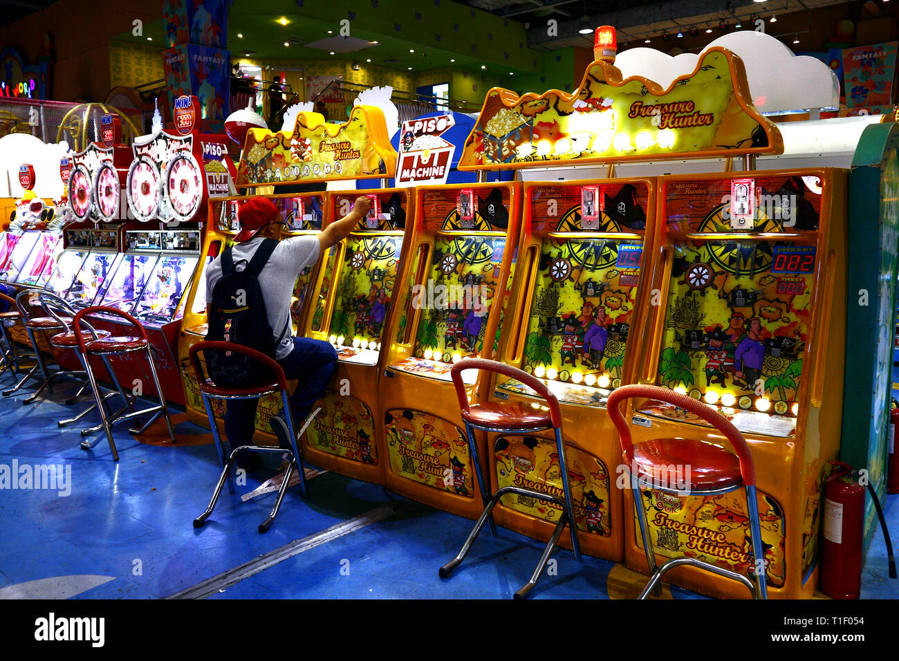 QUEZON CITY, PHILIPPINES - MARCH 24, 2019: Customers try different ...