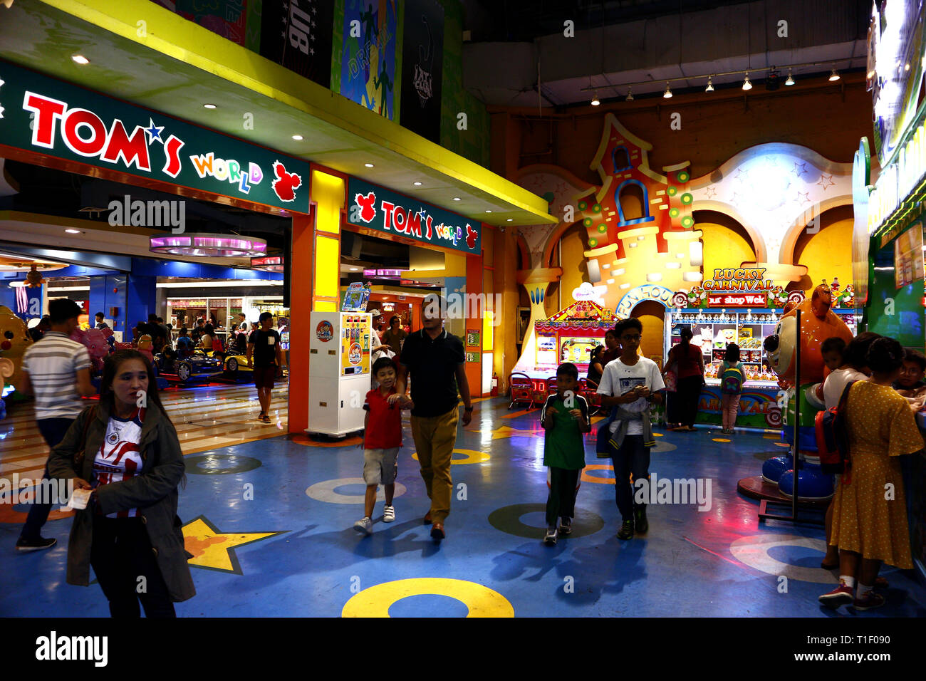 QUEZON CITY, PHILIPPINES - MARCH 24, 2019: Customers try different ...