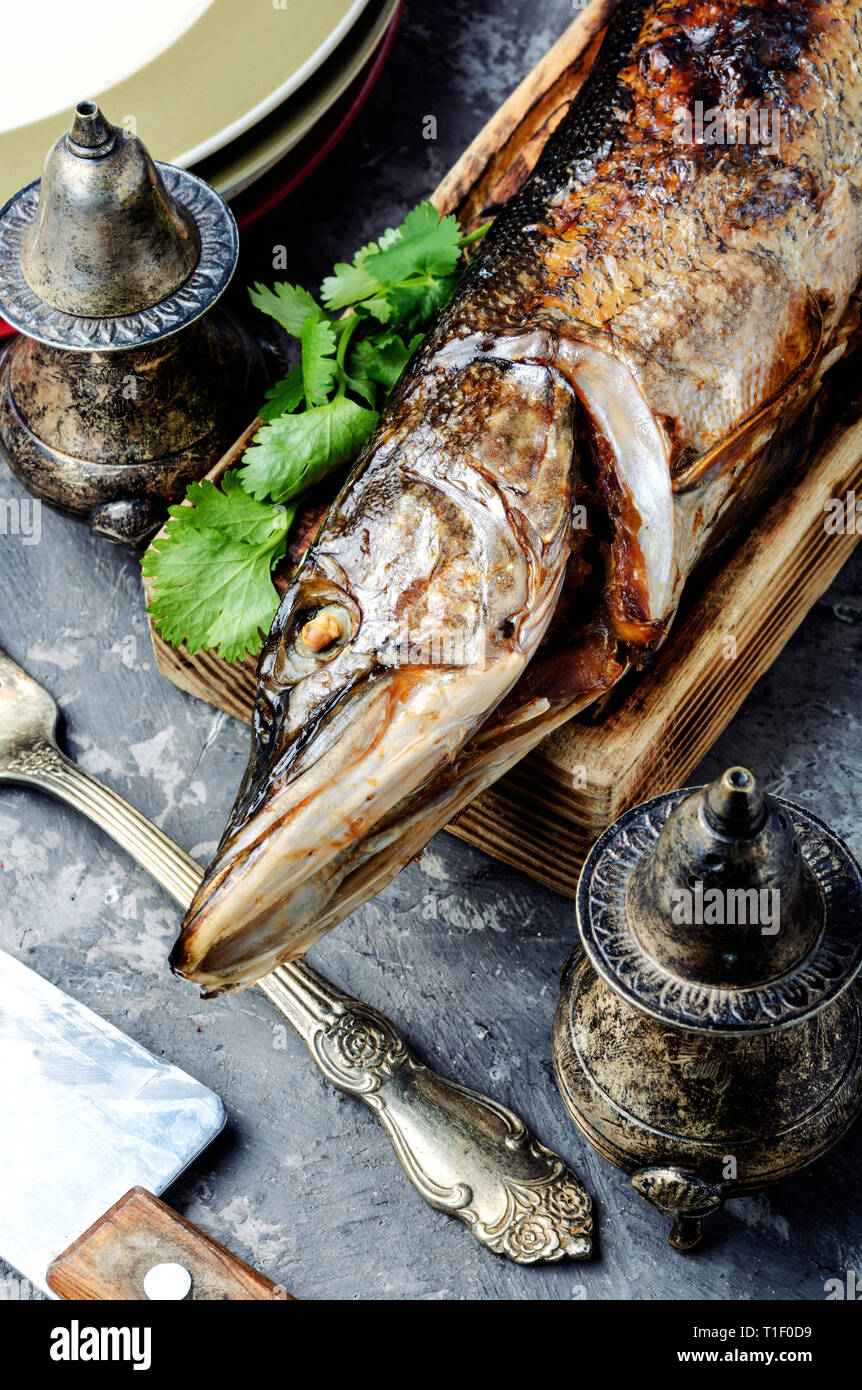 Pike stuffed with mushrooms.Pike royally.Banquet Russian dish Stock ...