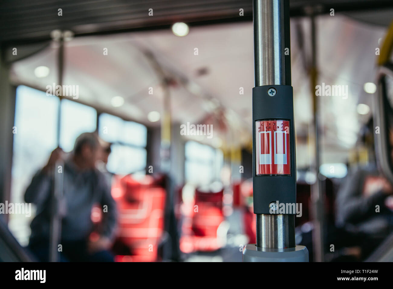 Interior of a public transport bus, stop button Stock Photo - Alamy