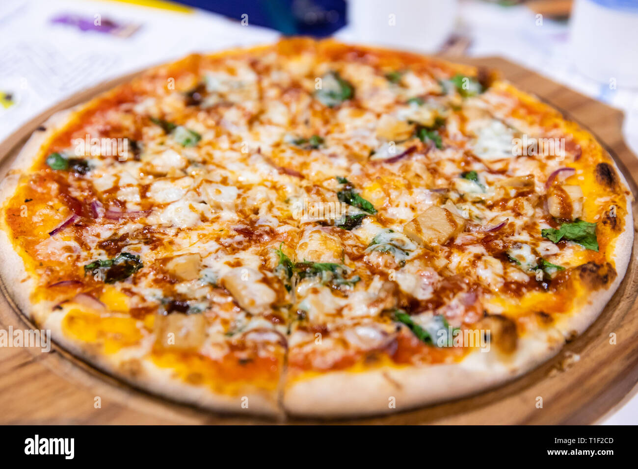 Hot pizza on kitchen table hi-res stock photography and images - Alamy