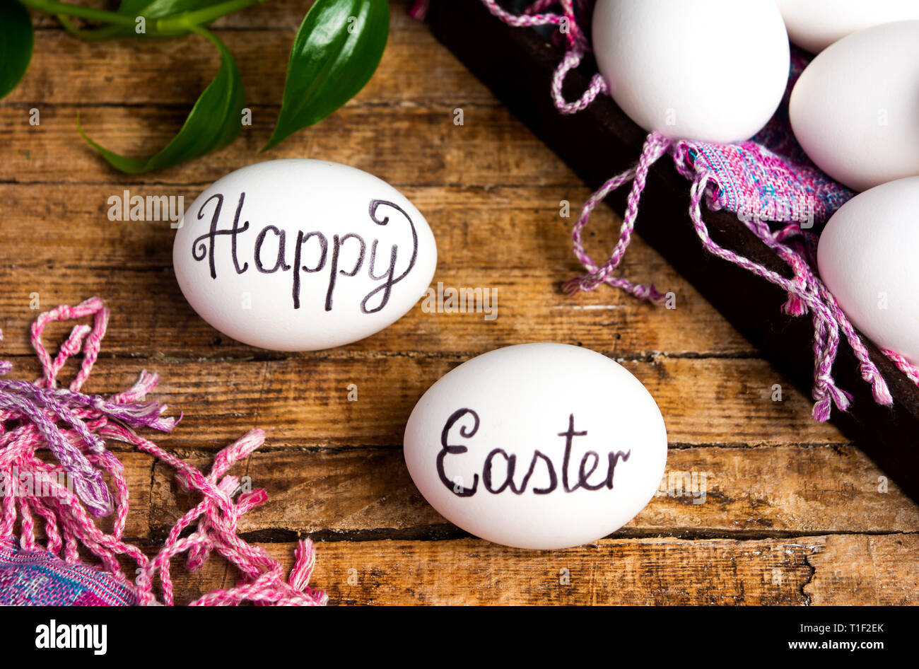 Happy Easter note written on eggs for religious holiday Stock Photo - Alamy