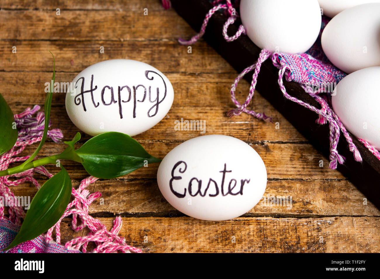 Happy Easter note written on eggs for religious holiday Stock Photo - Alamy