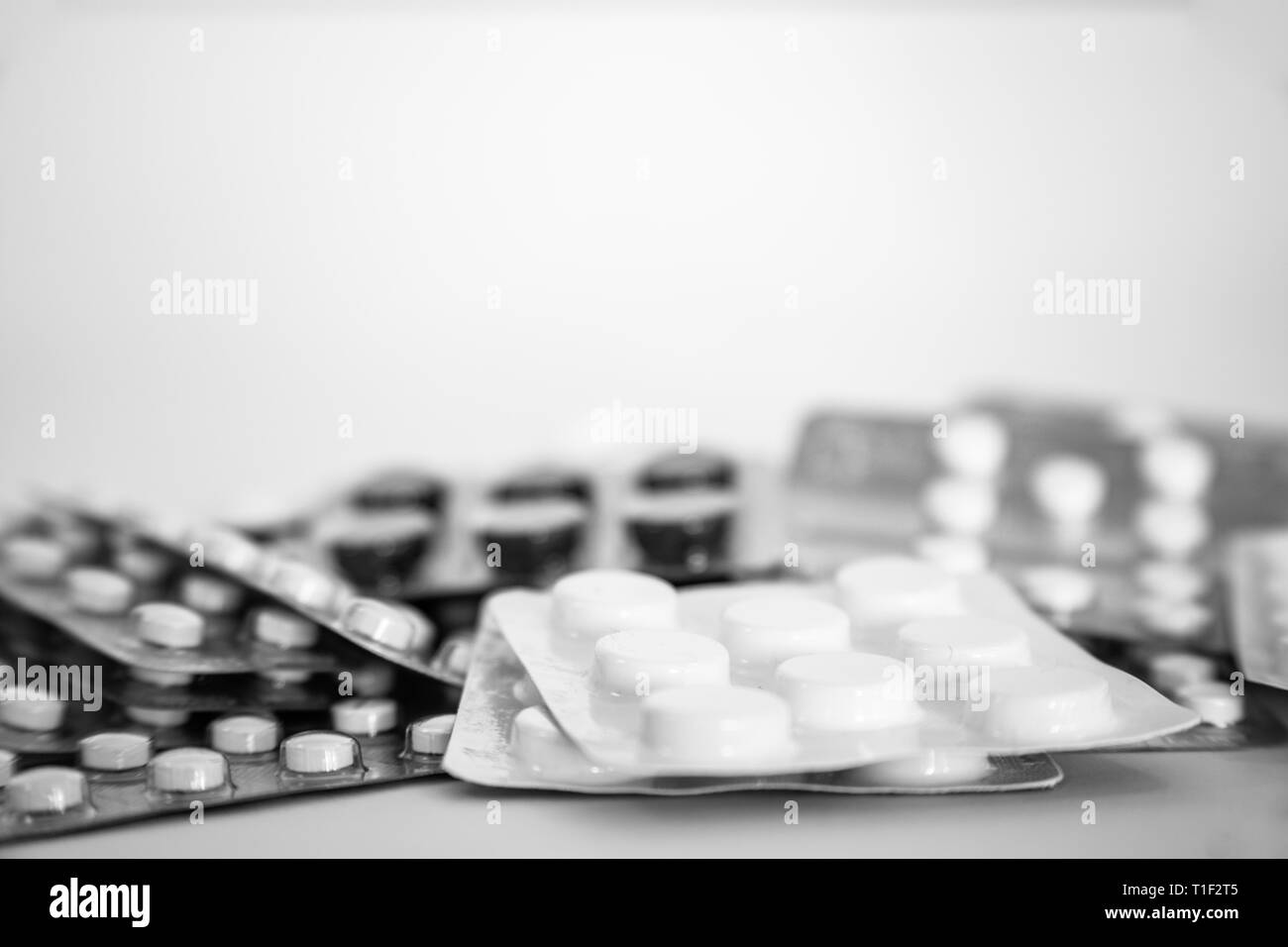 packaged pharmaceutical pills on a white background Stock Photo - Alamy