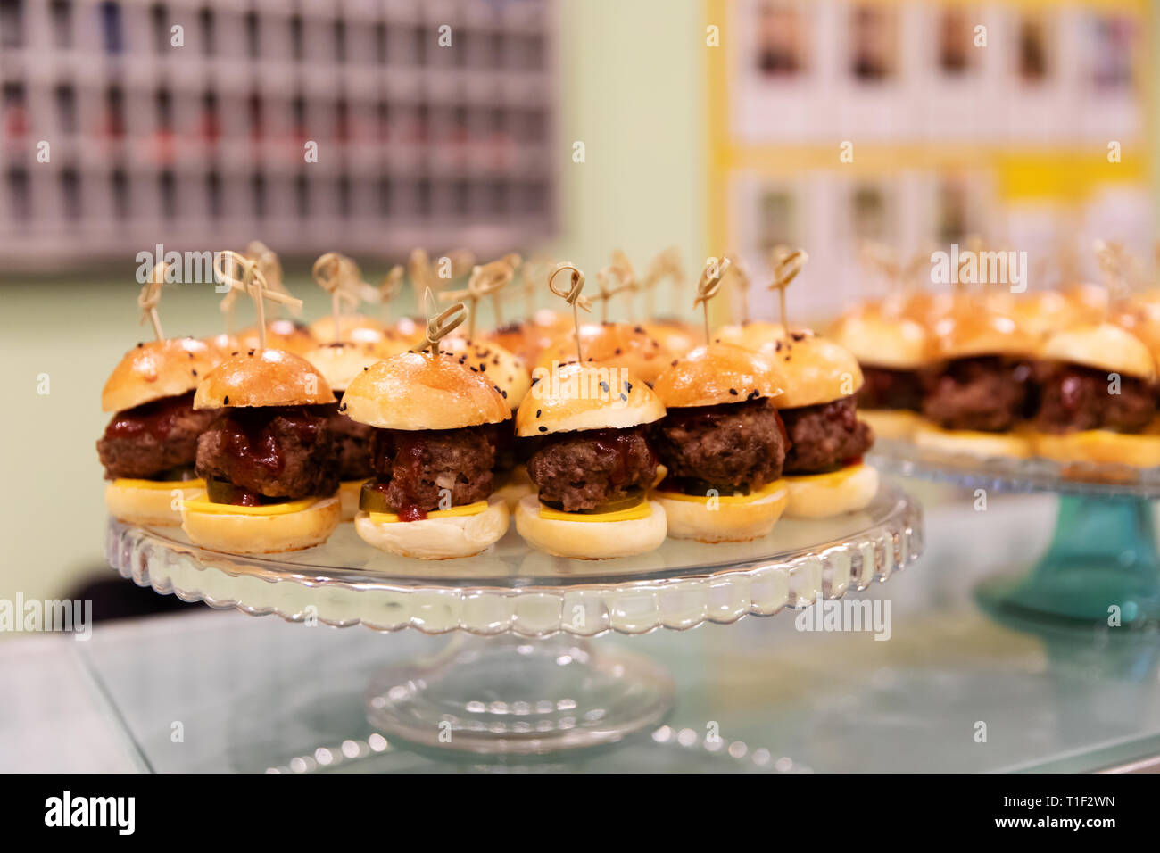 Mini burgers canapes snacks for furshet on the plate Stock Photo - Alamy