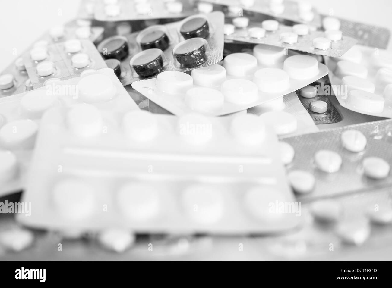 packaged pharmaceutical pills on a white background Stock Photo - Alamy