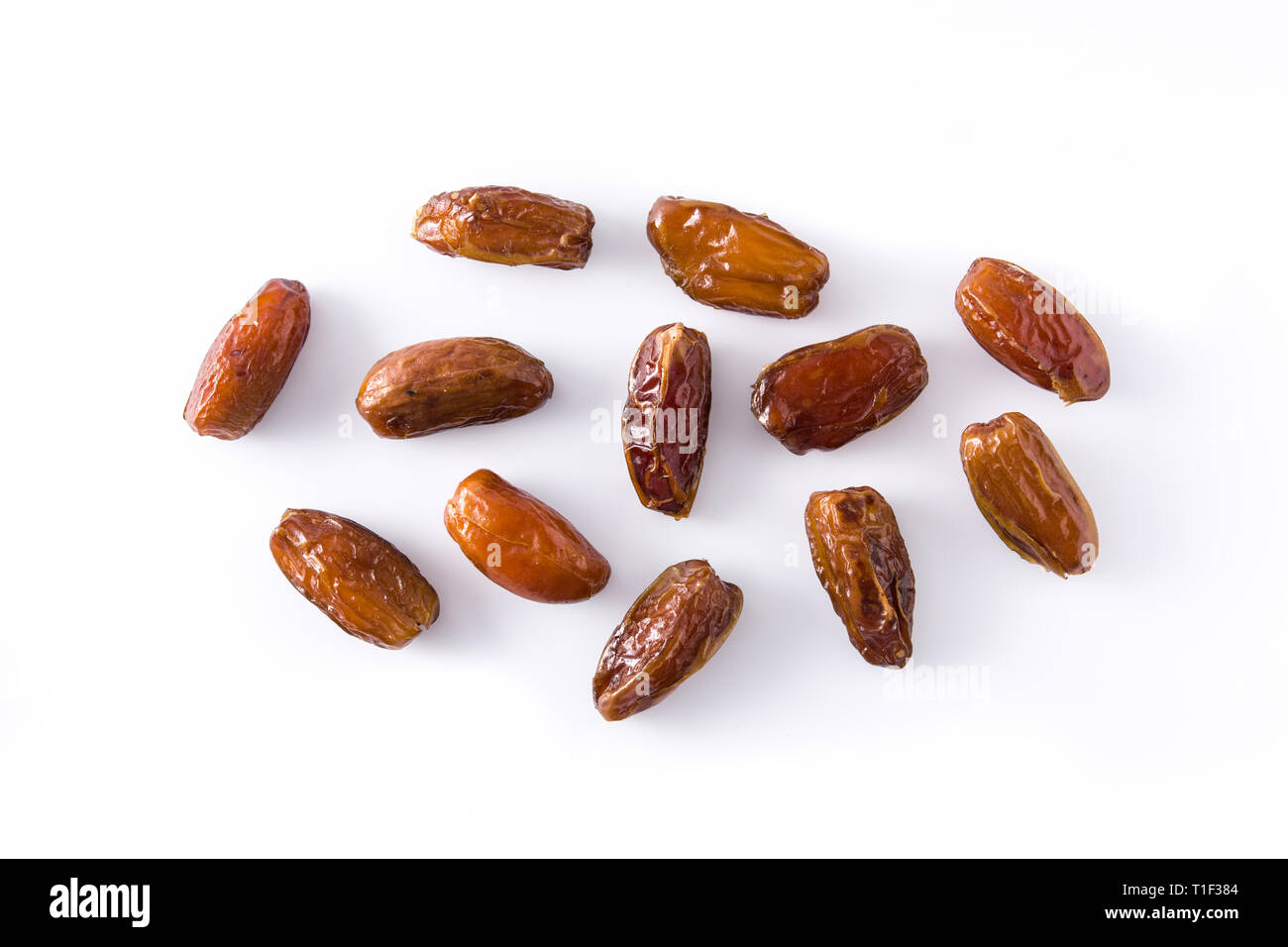Dates isolated on white background. Top view Stock Photo - Alamy