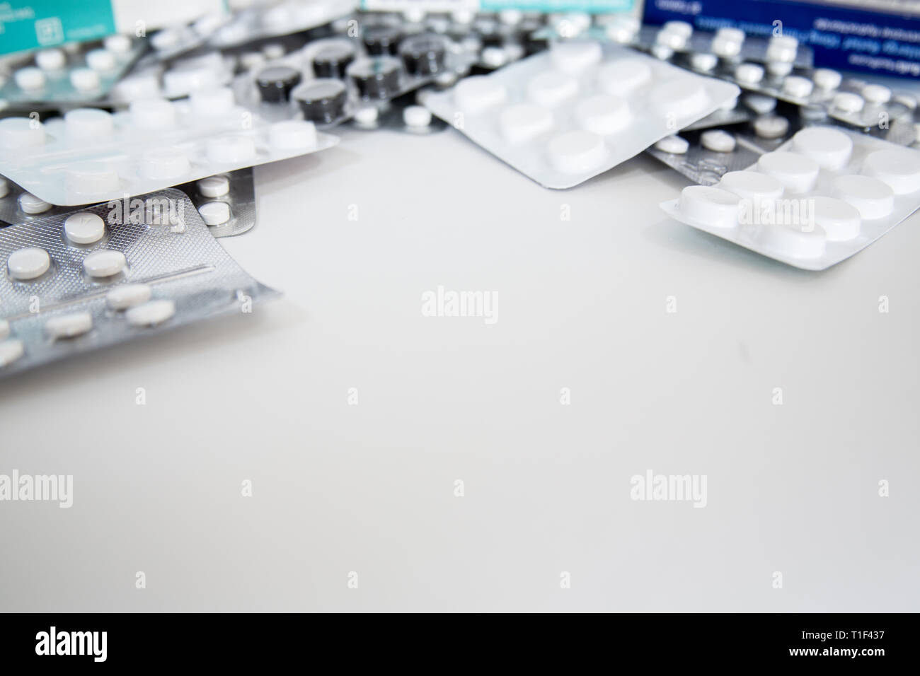 packaged pharmaceutical pills on a white background Stock Photo - Alamy