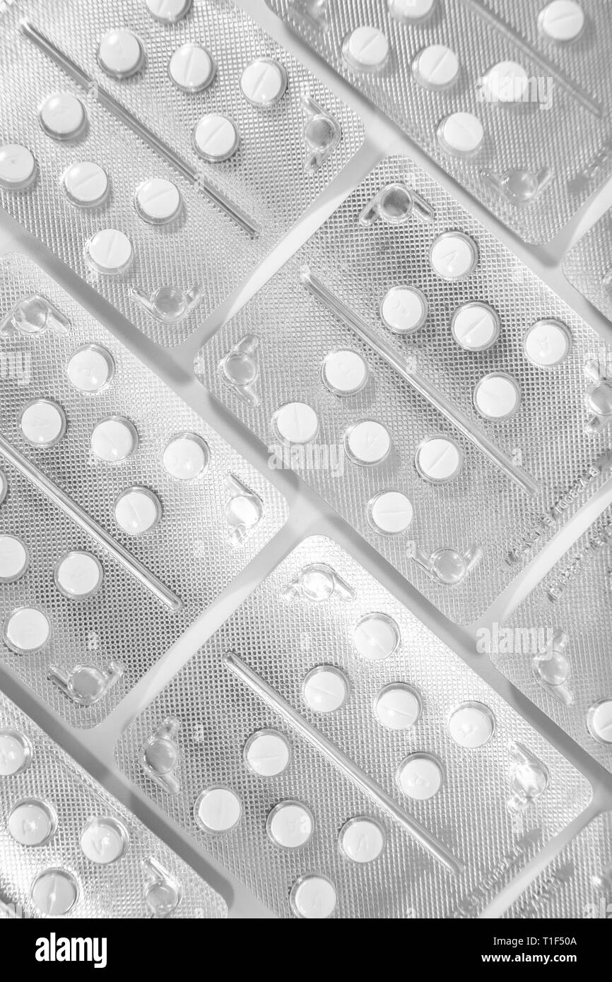 packaged pharmaceutical pills on a white background Stock Photo - Alamy