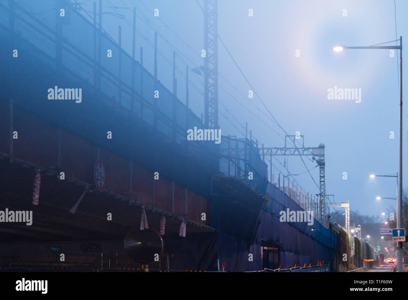 street light with rainbow colored halo in the foggy morning Stock Photo ...