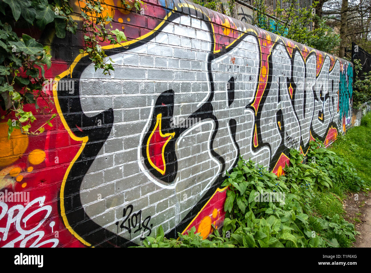 Contemporary Graffiti Street art on large wall Stock Photo - Alamy