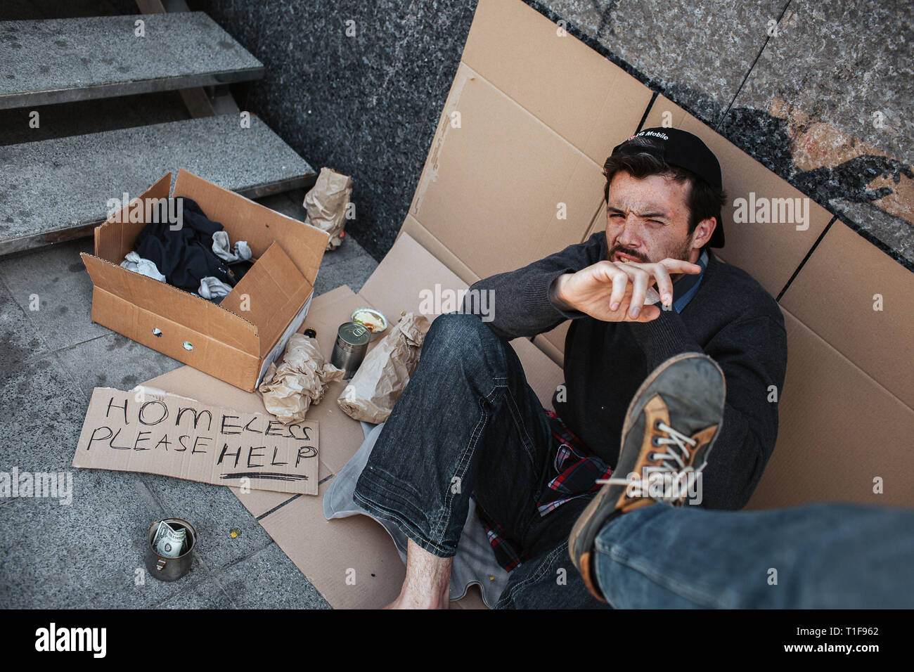 Money beggar bank hi-res stock photography and images - Alamy
